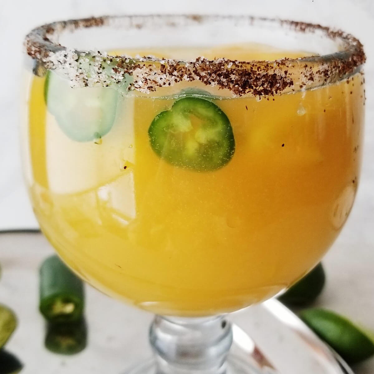 Spicy Mango Margarita Mocktail - The Hint of Rosemary